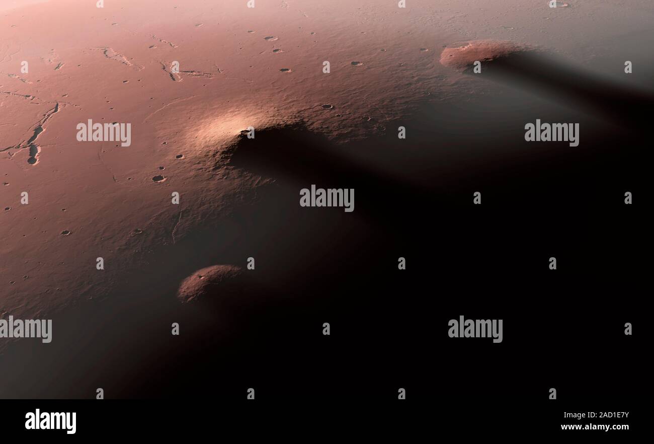Volcanoes on Mars. Computer artwork showing volcanoes on the surface of ...