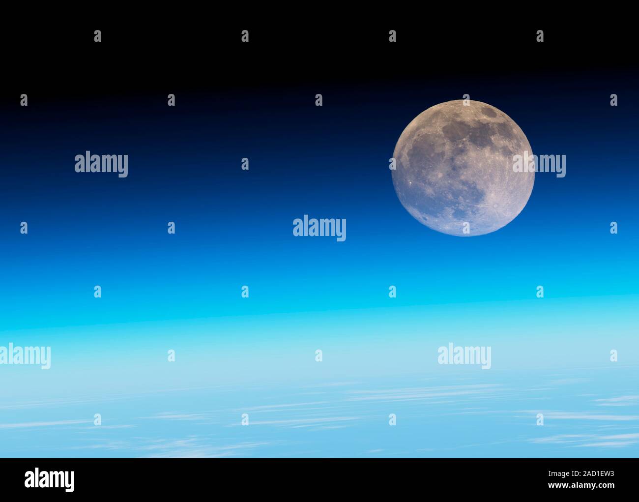 Moon over the Earth. Computer illustration of a view across the Earth's ...