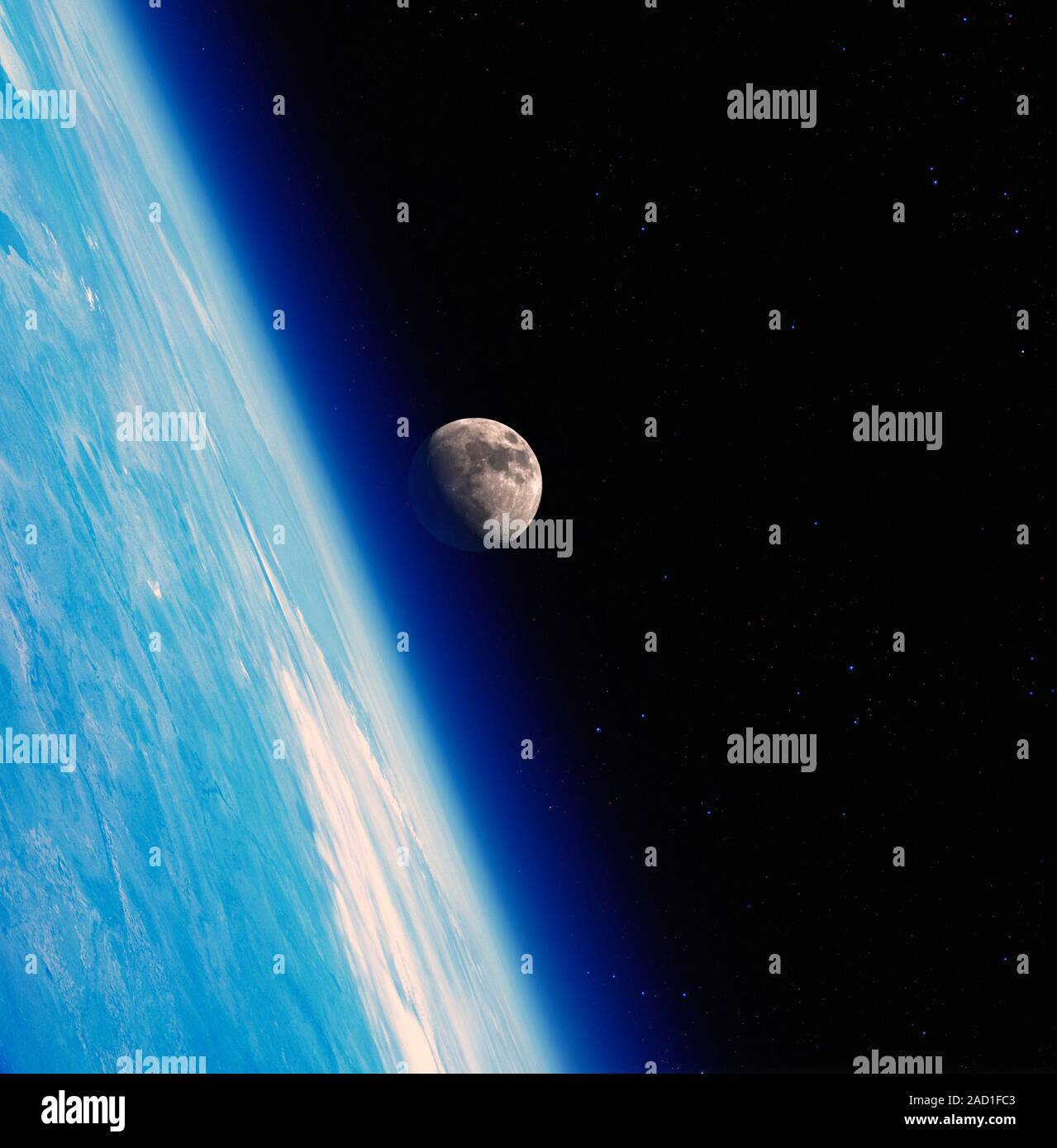 Earth and Moon from orbit. Looking across the Earth's outer atmosphere ...