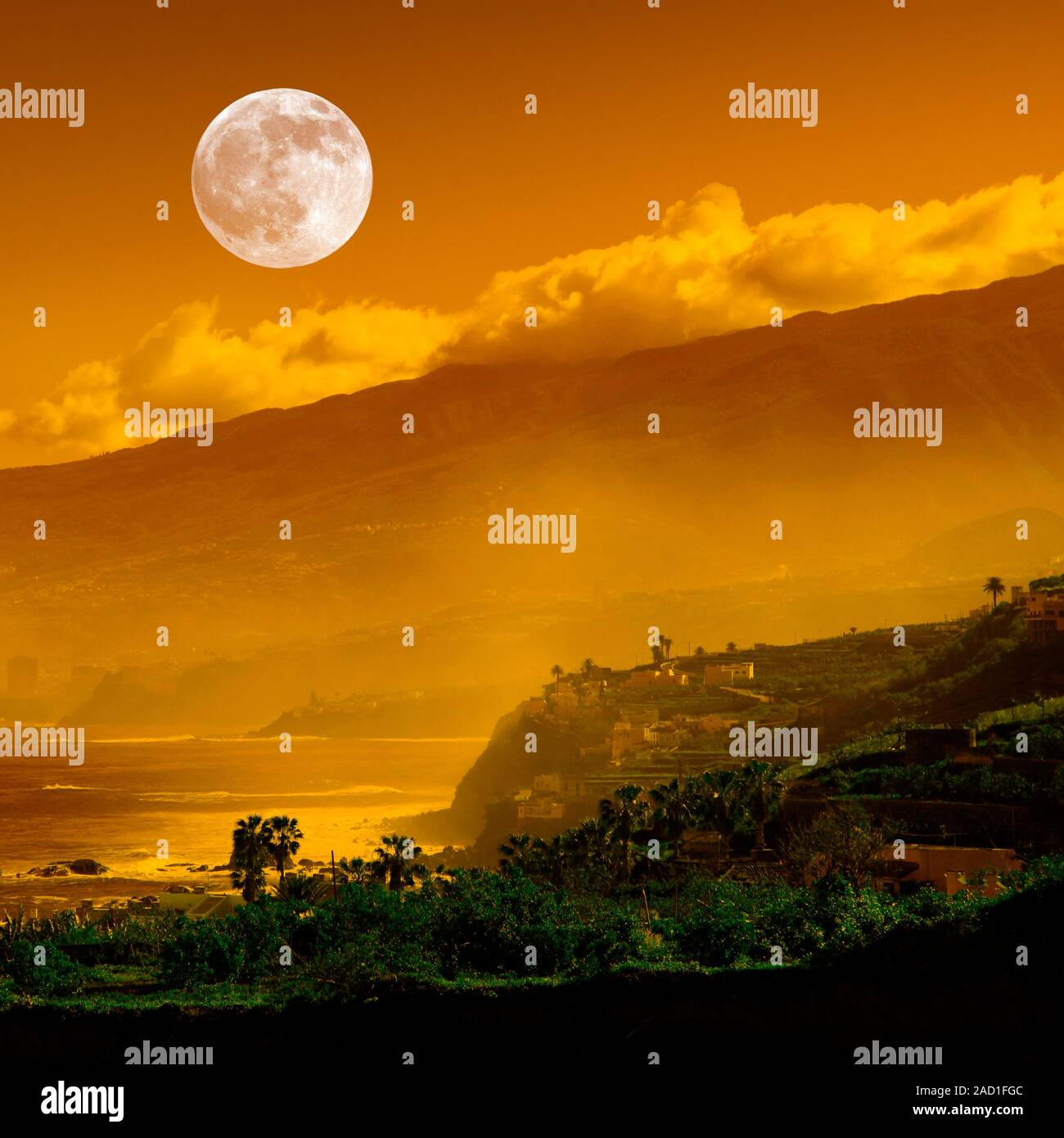 Full moon over coast Stock Photo - Alamy