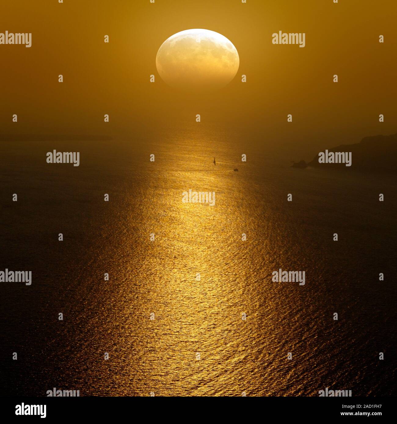 Moon setting over the ocean Stock Photo - Alamy
