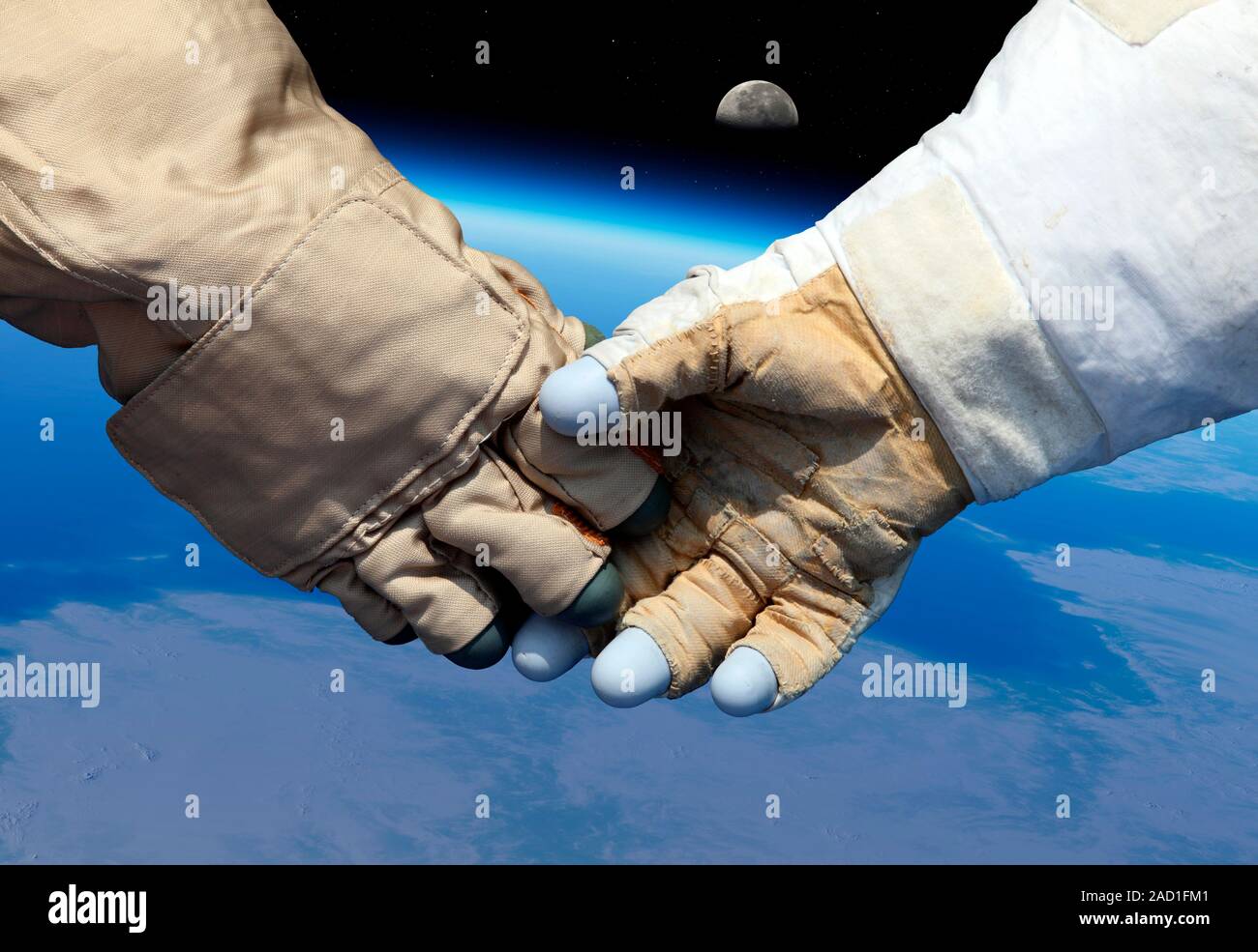 Cosmonaut and astronaut shaking hands. Composite image of a Soviet ...
