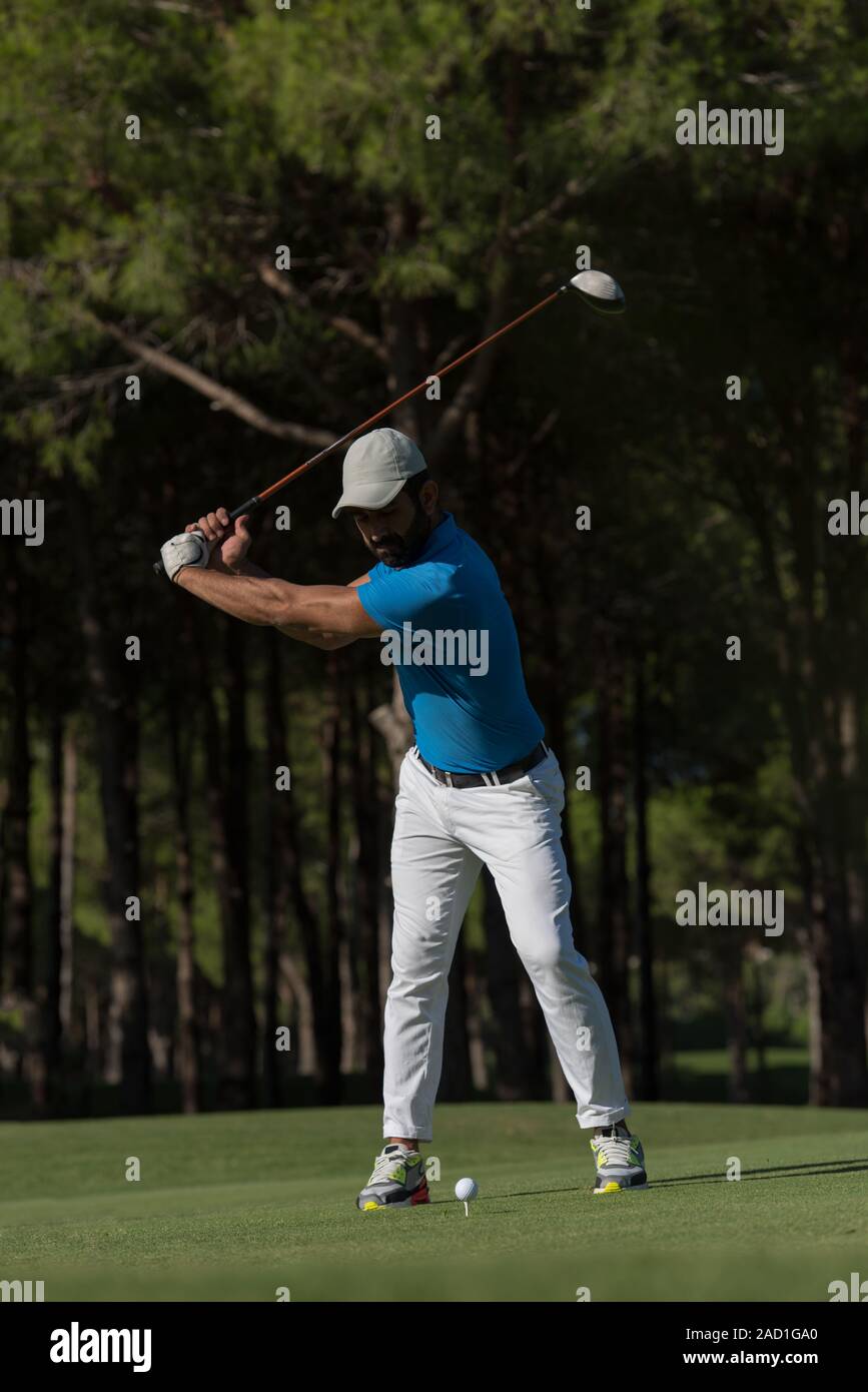 golf player hitting shot Stock Photo - Alamy