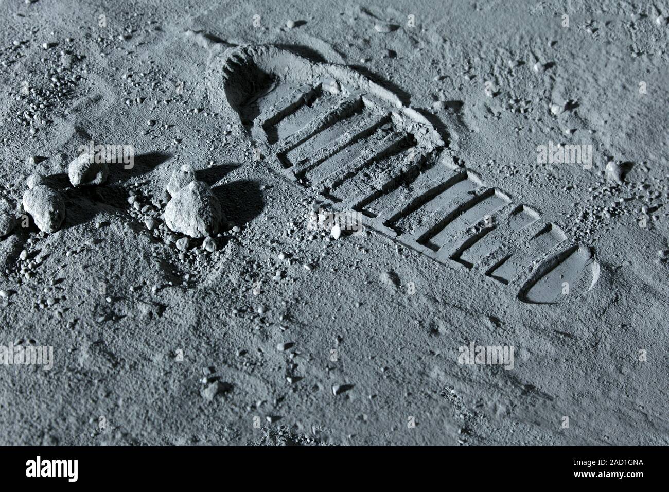 Walking on the Moon. Computer illustration of an astronaut's bootprint on the surface of the ...