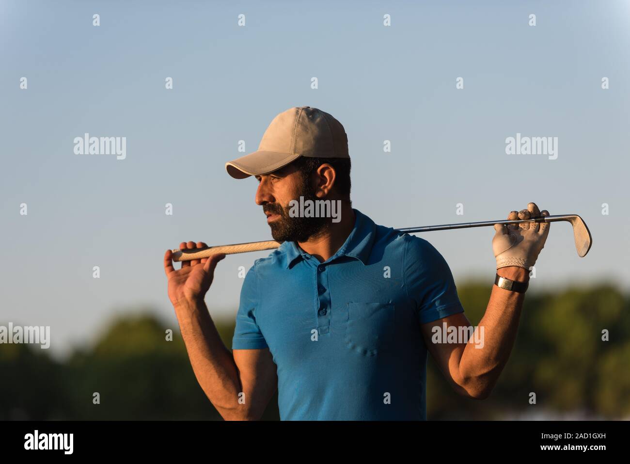 golfer portrait at golf course on sunset Stock Photo - Alamy