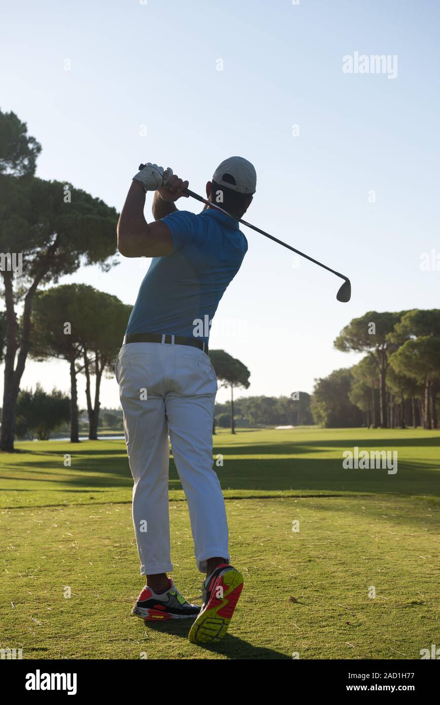 golf player hitting shot Stock Photo - Alamy