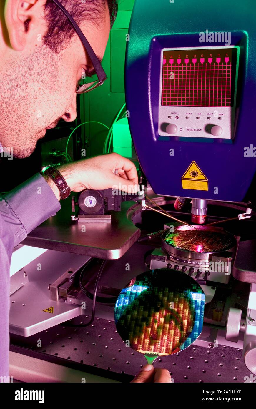 Medical sensor research. Researcher testing an advanced design of ...