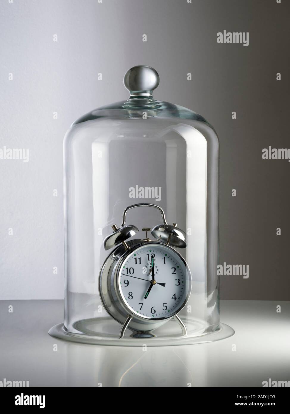 Alarm clock inside a bell jar. This illustrates an experiment to show ...
