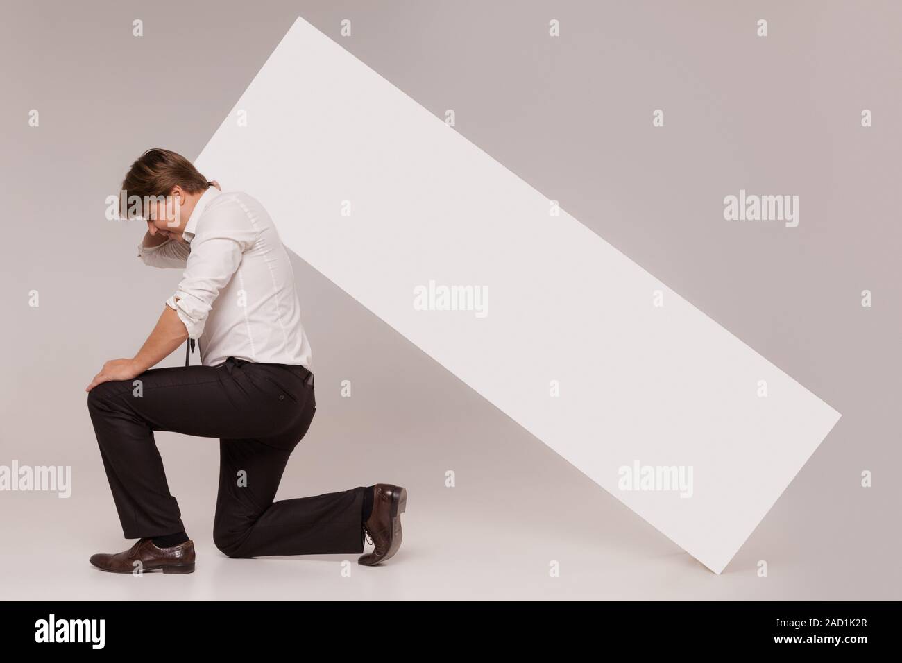 Man kneeled hi-res stock photography and images - Alamy