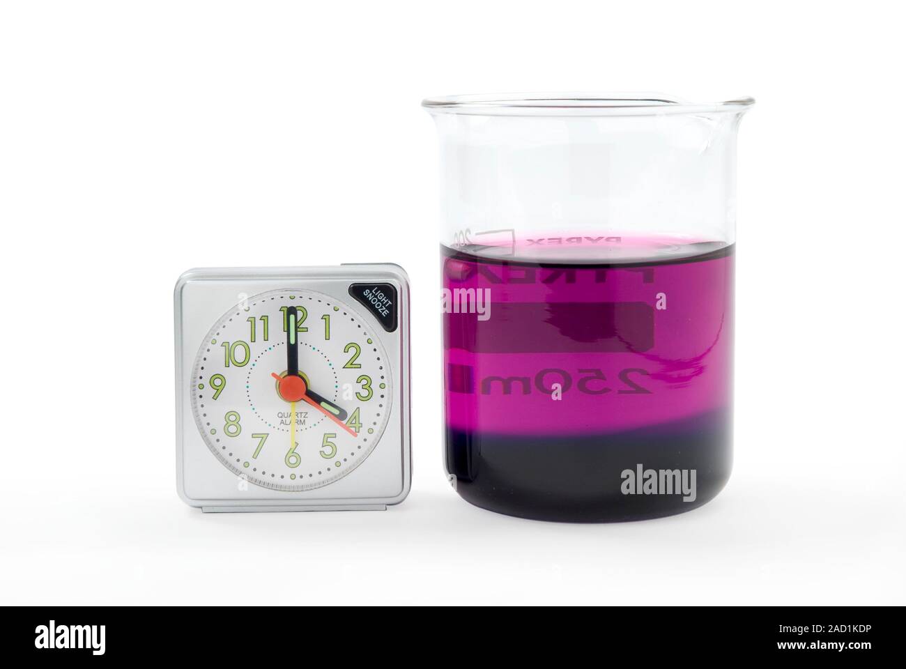 Potassium permanganate diffusion in water. Beaker containing potassium ...