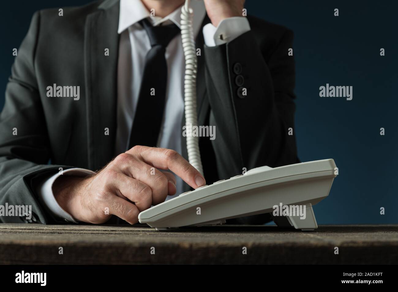 Man using landline phone in hi-res stock photography and images - Alamy