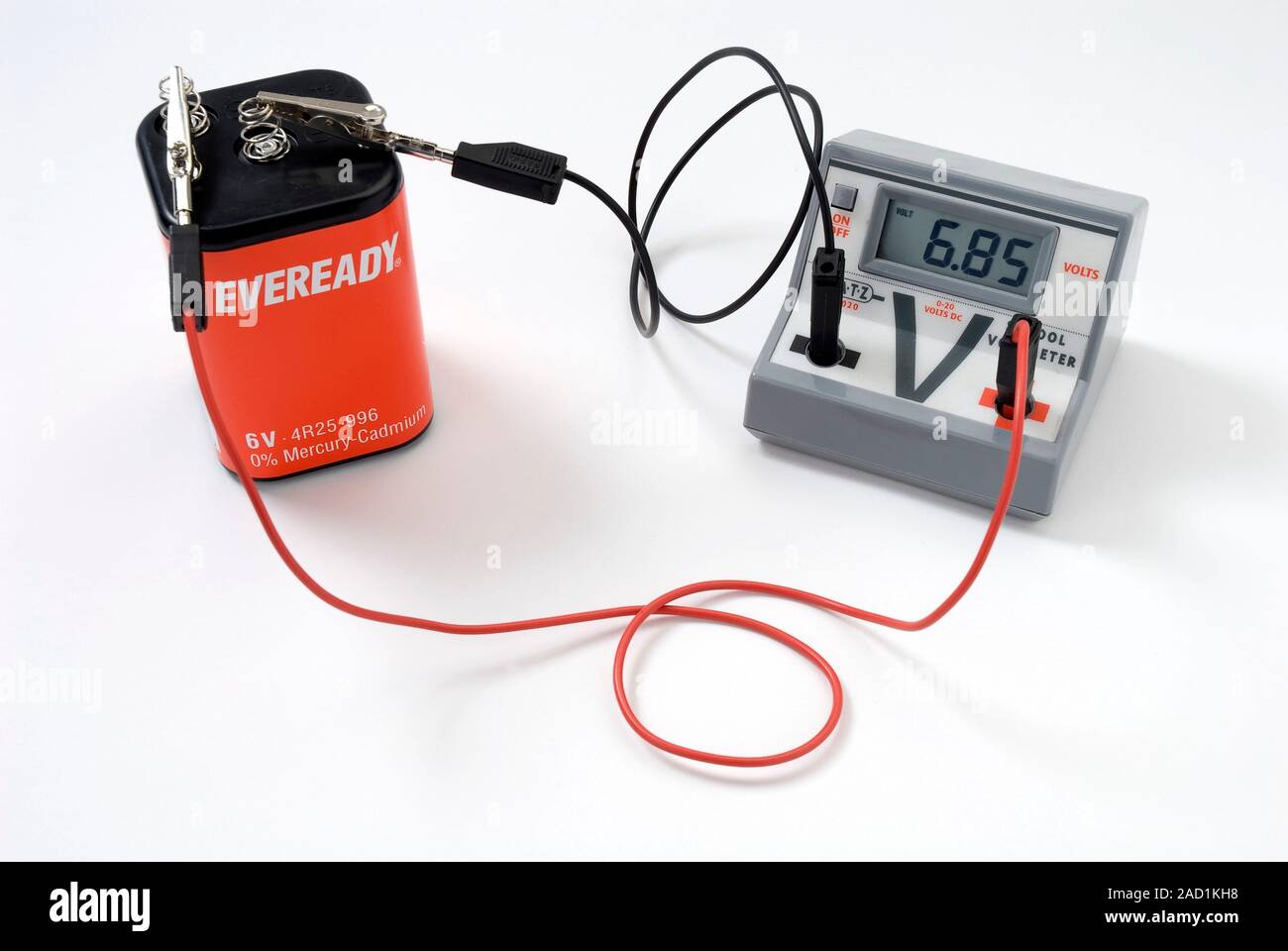 Voltmeter in use. Digital voltmeter (right) being used to show the ...