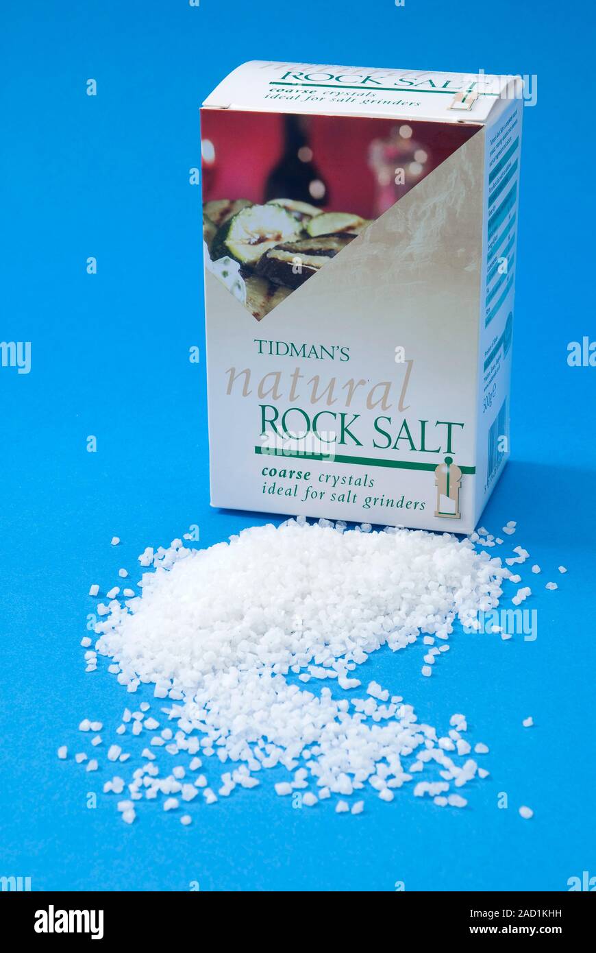 Rock salt. Box of natural rock salt (sodium chloride) for cooking Stock ...
