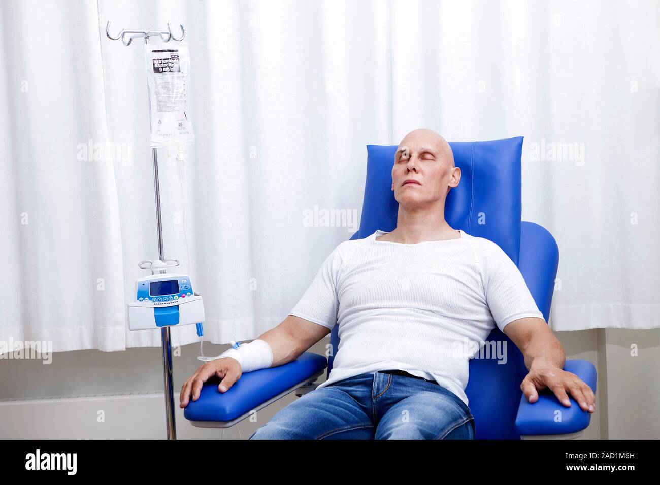Chemotherapy treatment. Cancer patient undergoing chemotherapy in a ...