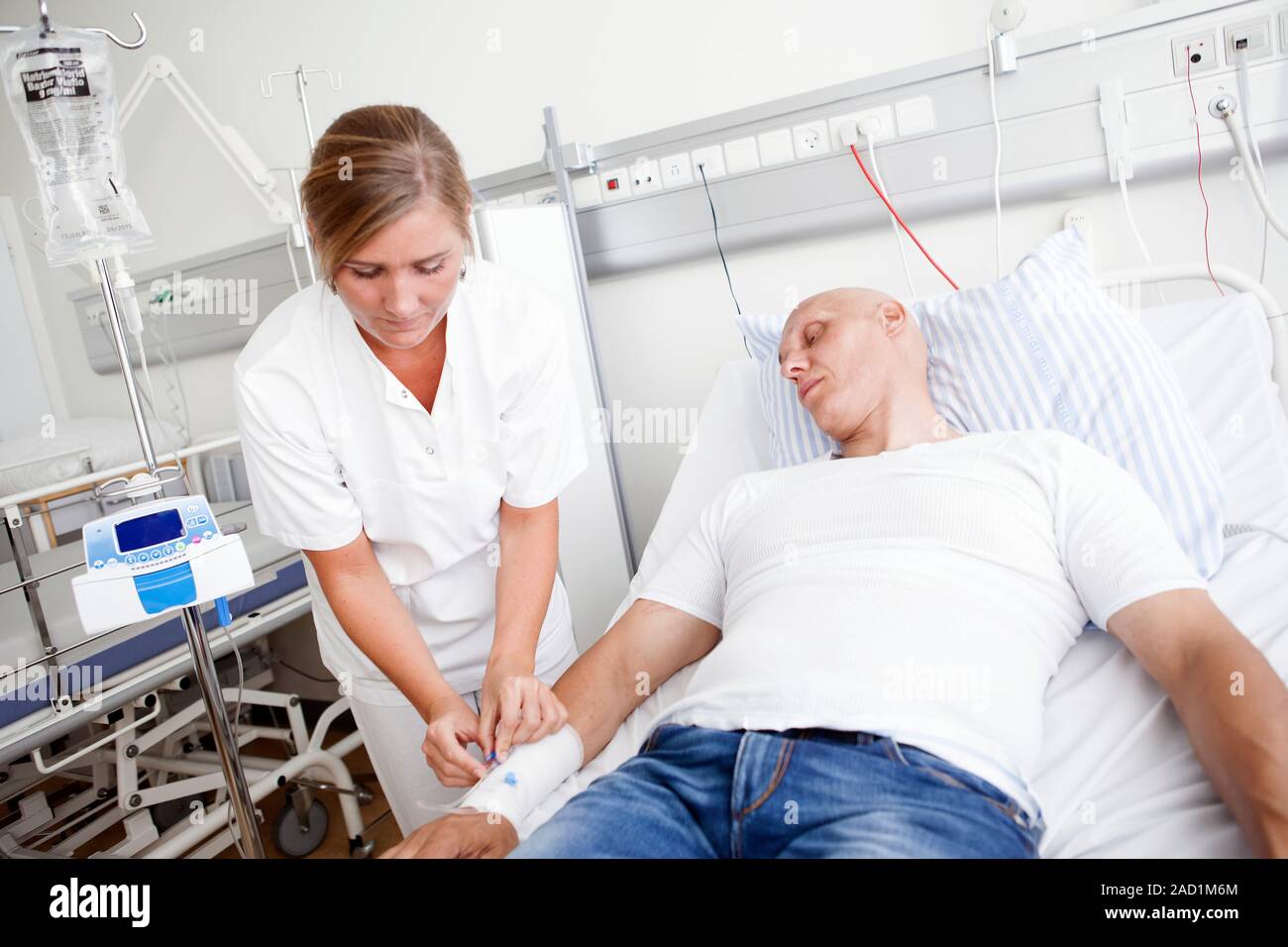 Chemotherapy treatment. Cancer patient undergoing chemotherapy in a ...