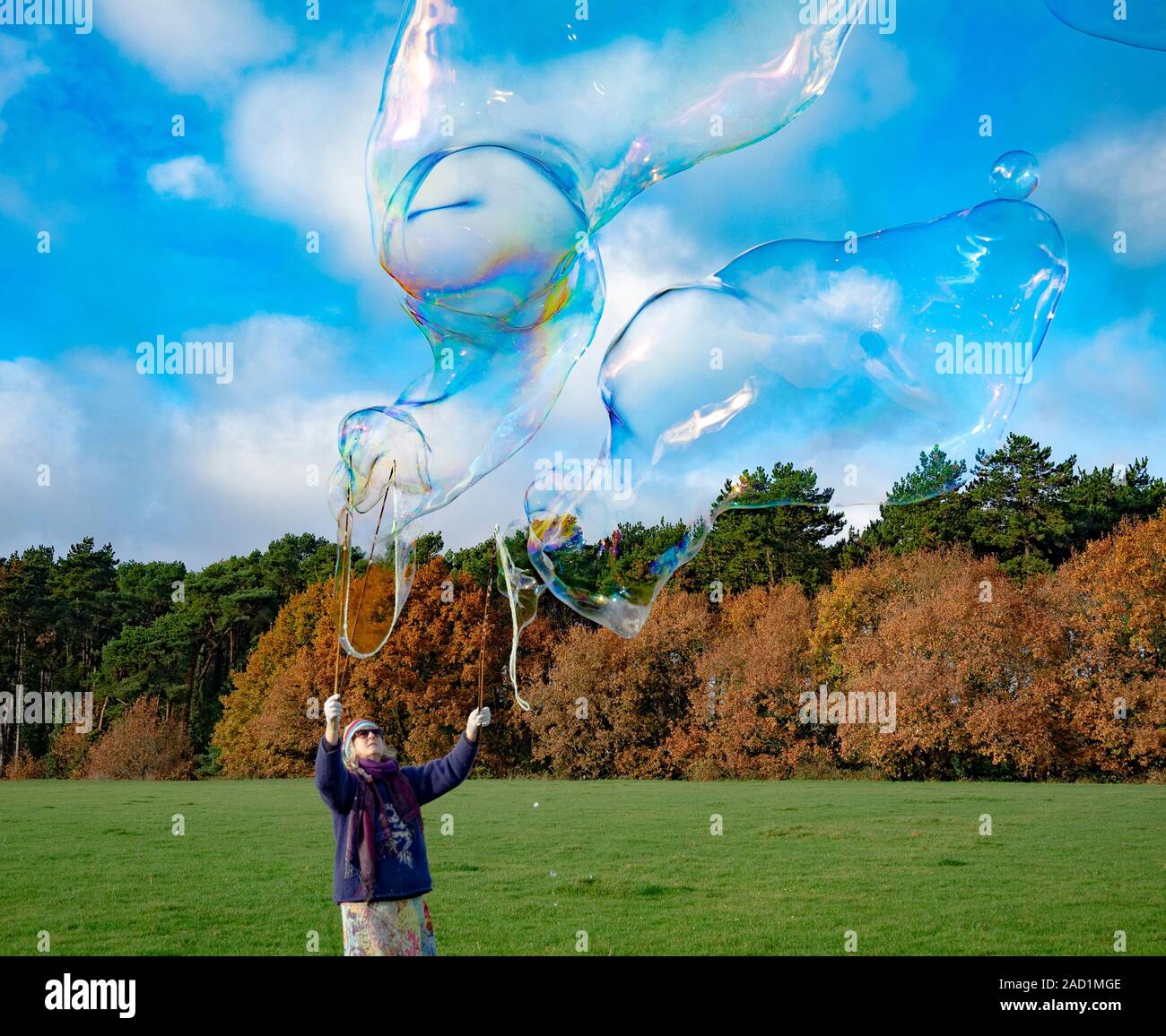 Mature woman blowing bubbles hi-res stock photography and images - Alamy