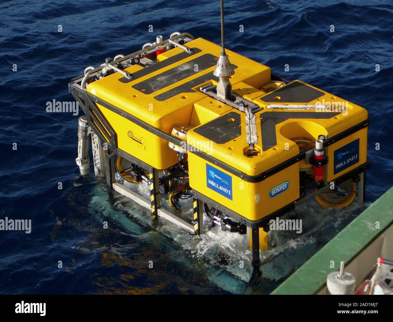 Holland marine ROV (remote operated vehicle) being lowered into the sea ...