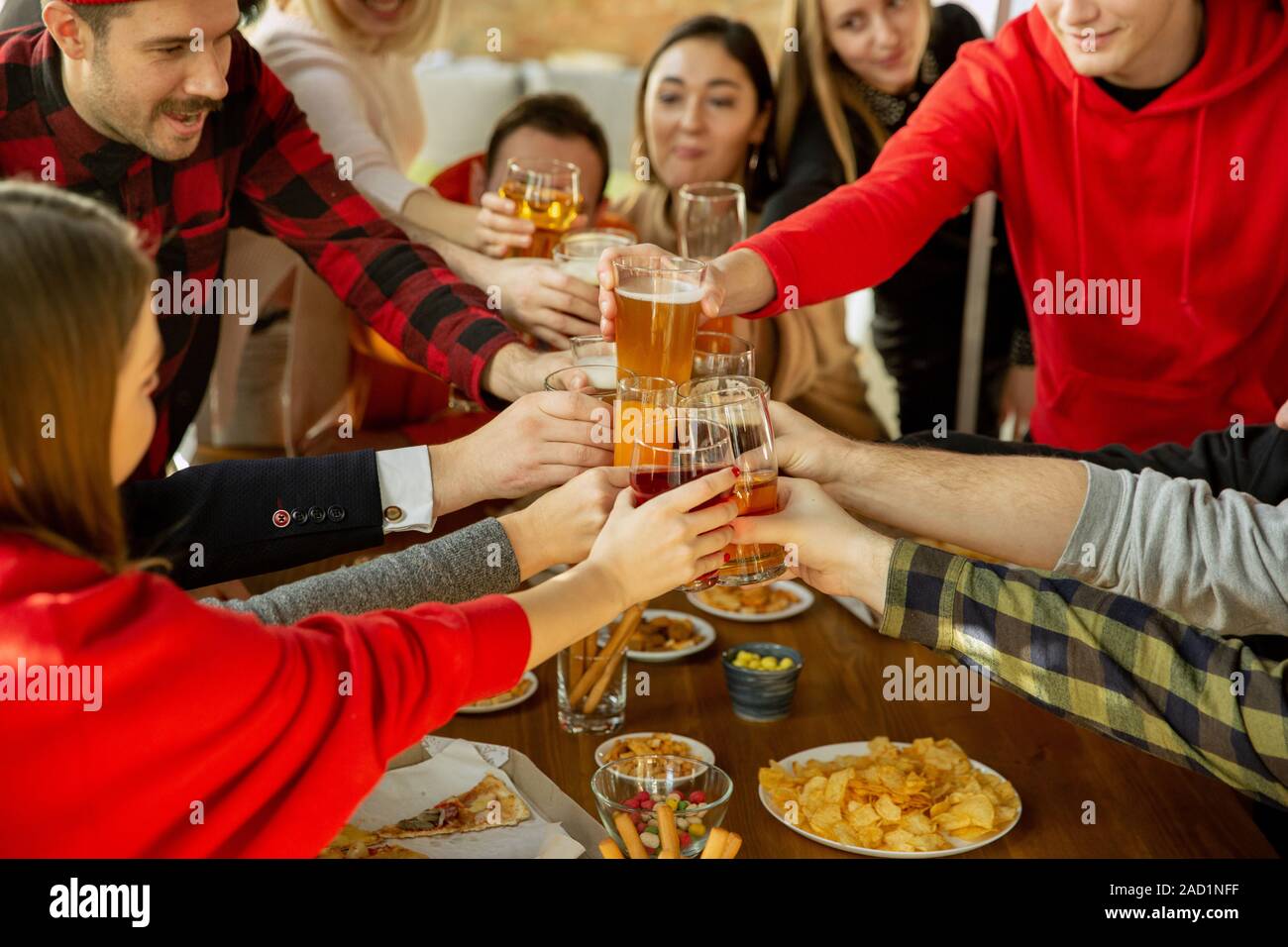 Happy co-workers celebrating while company party and corporate event ...