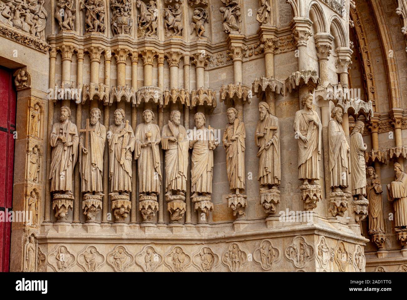 Detail of the stone carving of saints apostles in the arch entrance t ...