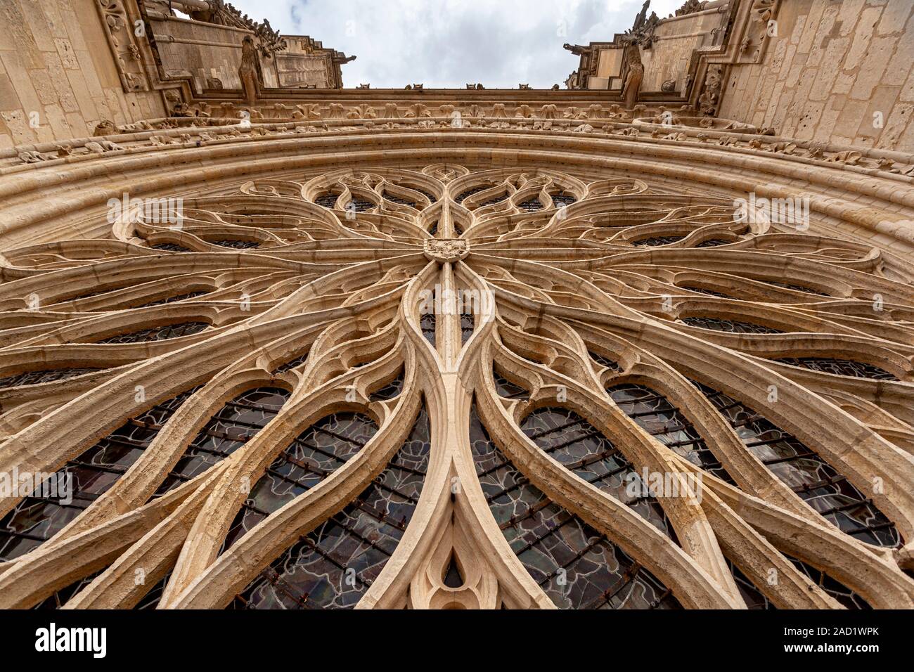 The carved stained glass rose window of the Notre Dame d'Amiens ...