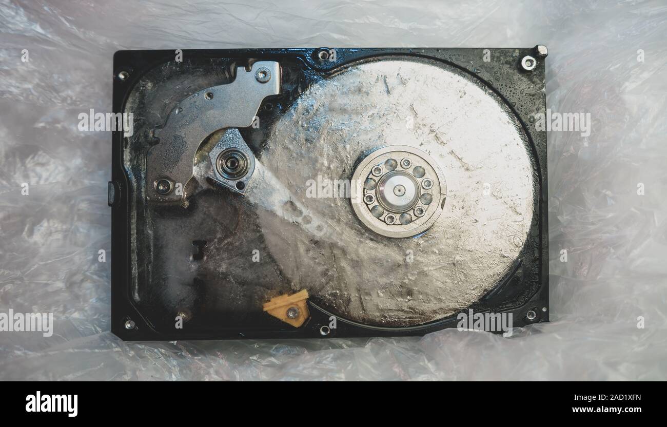 Close up beautiful open detail frozen hard disk on a table background ...