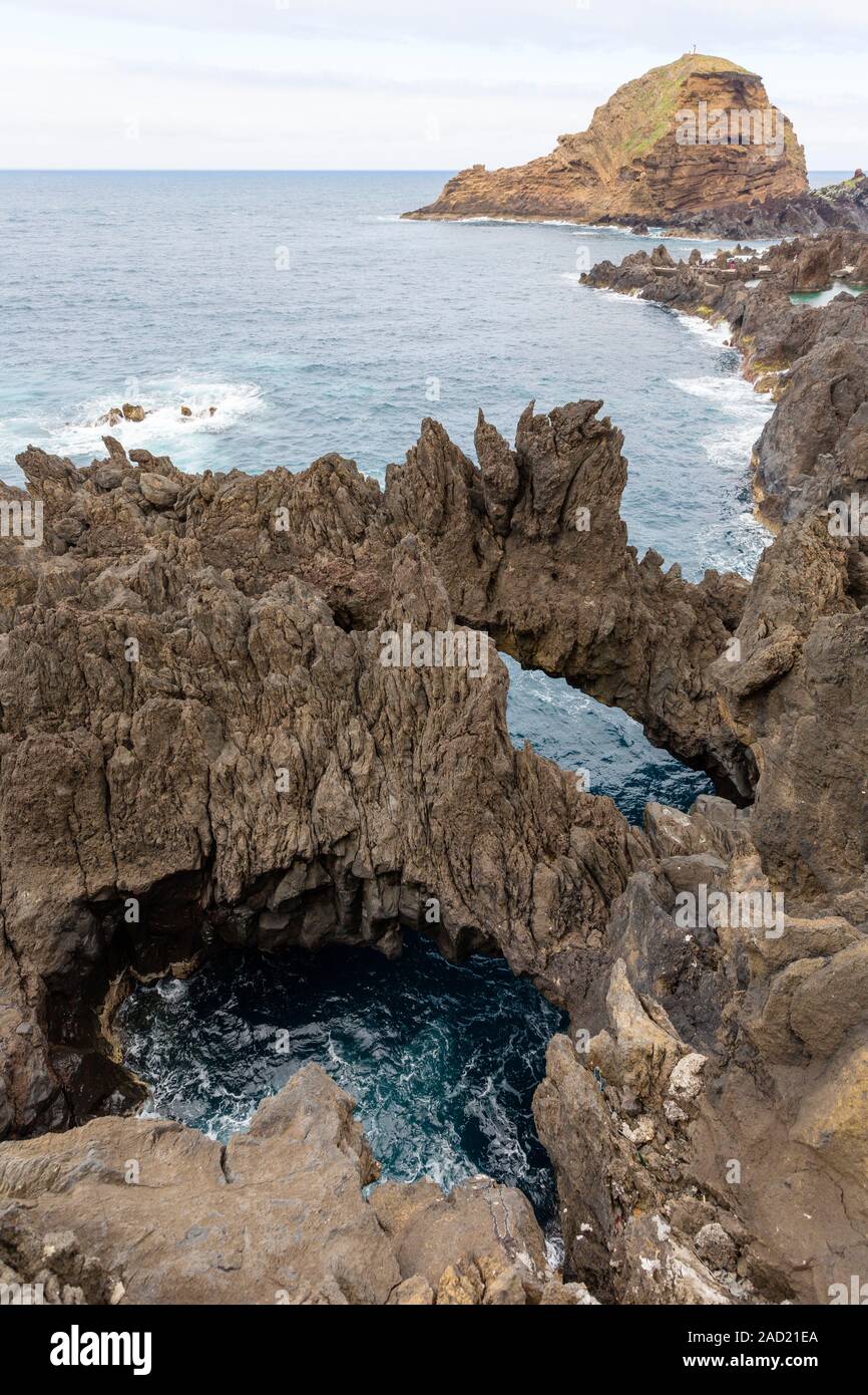 Rock windows at the coast of Porto Moniz in north-western Madeira Stock ...
