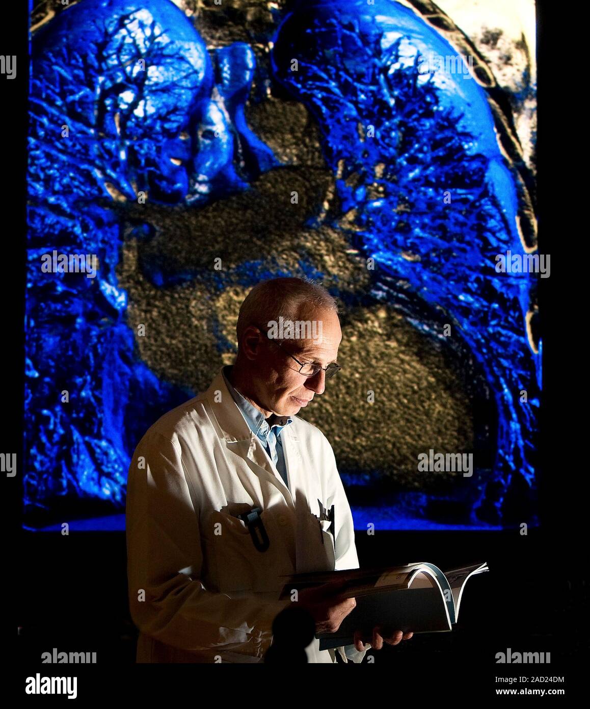 Anders Persson (born 1953), Swedish radiologist, with a scan of the ...