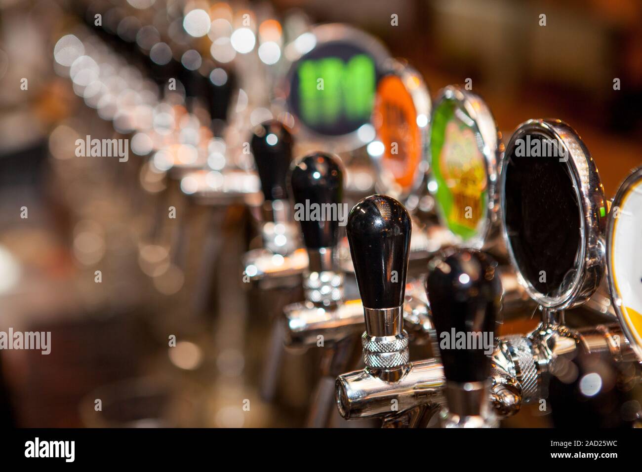 Row of Beer Taps in Bar for different types of drink. Bar interior ...