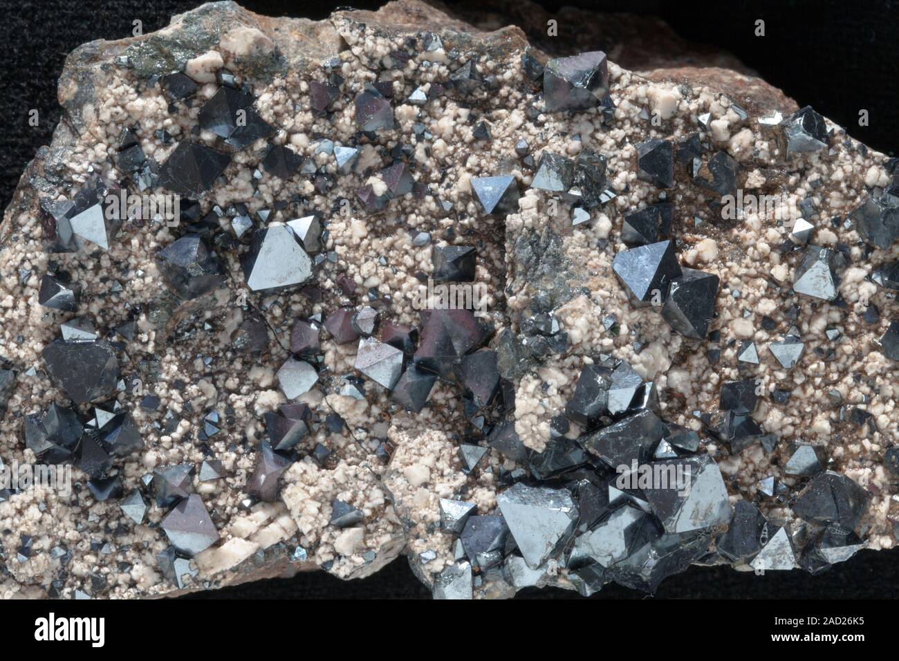 Octahedral crystals of Magnetite, an iron oxide (Fe3O4) that is one ...