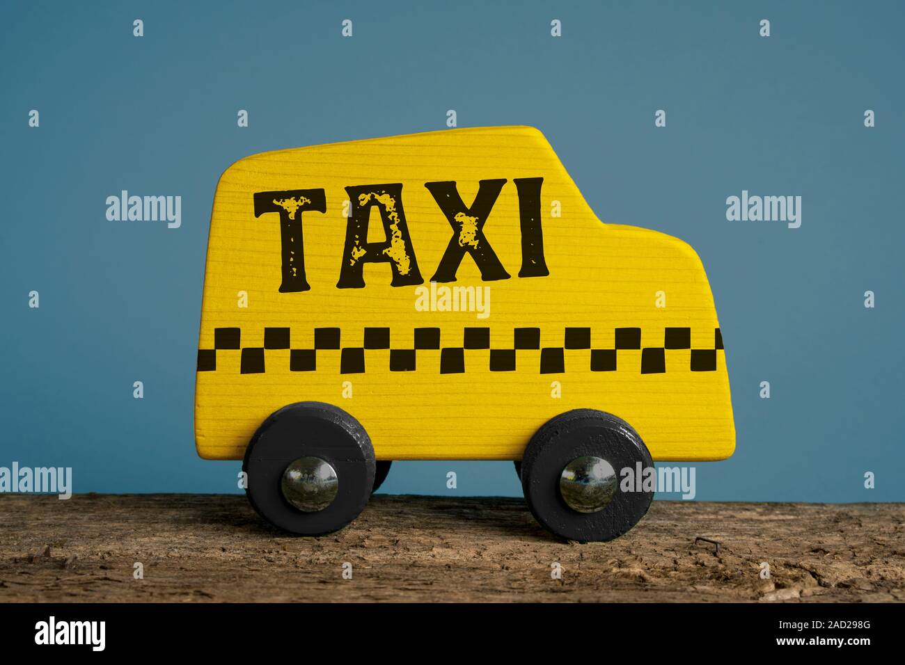 Toy taxi car. Wooden handmade toy car. Urban service concept Stock ...