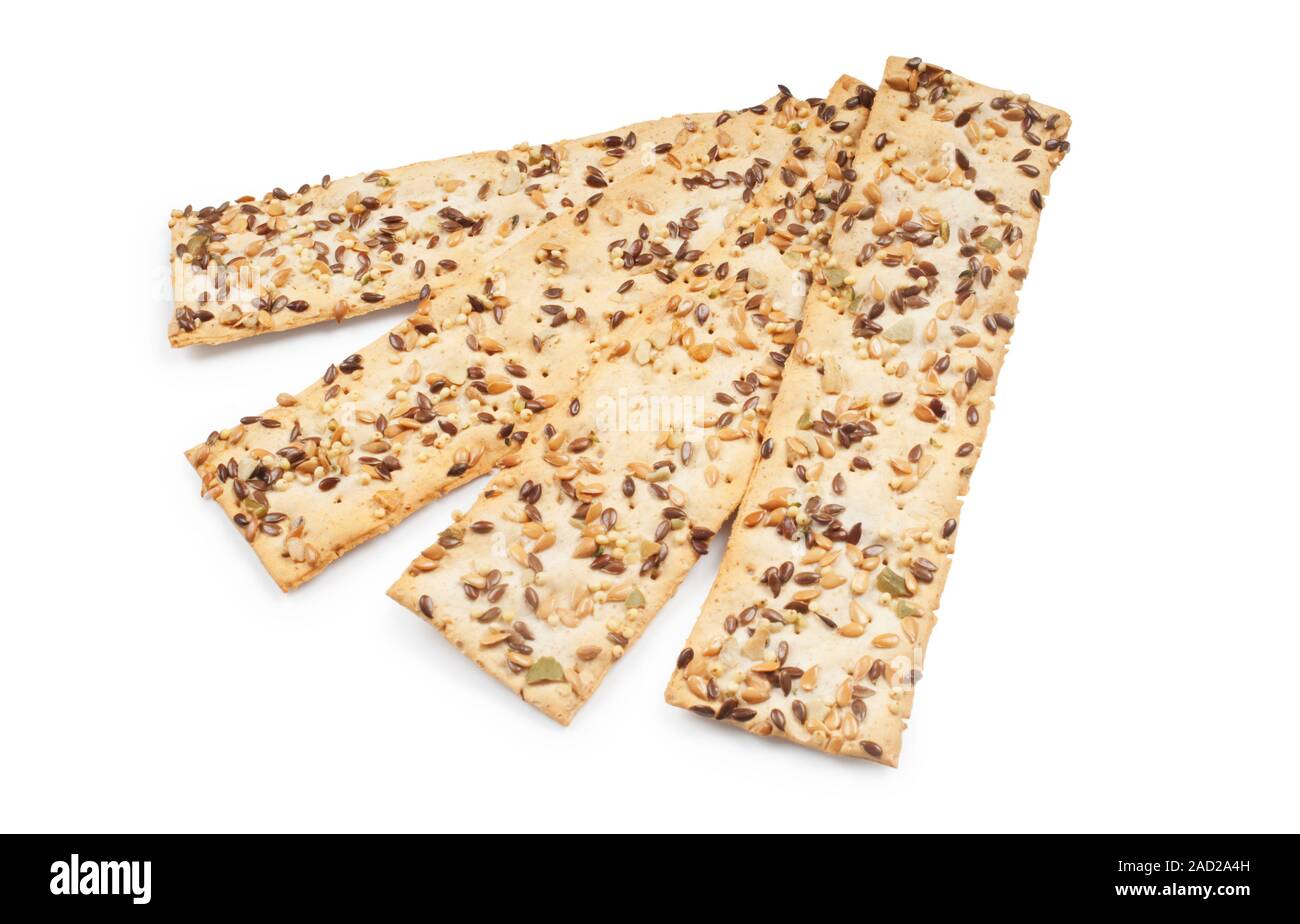 Studio shot of multi seed flatbread cut out against a white background ...