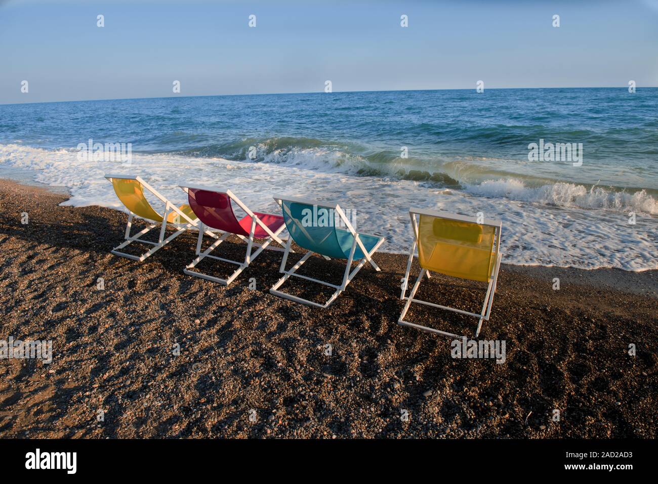 colorful beach chairs Stock Photo - Alamy