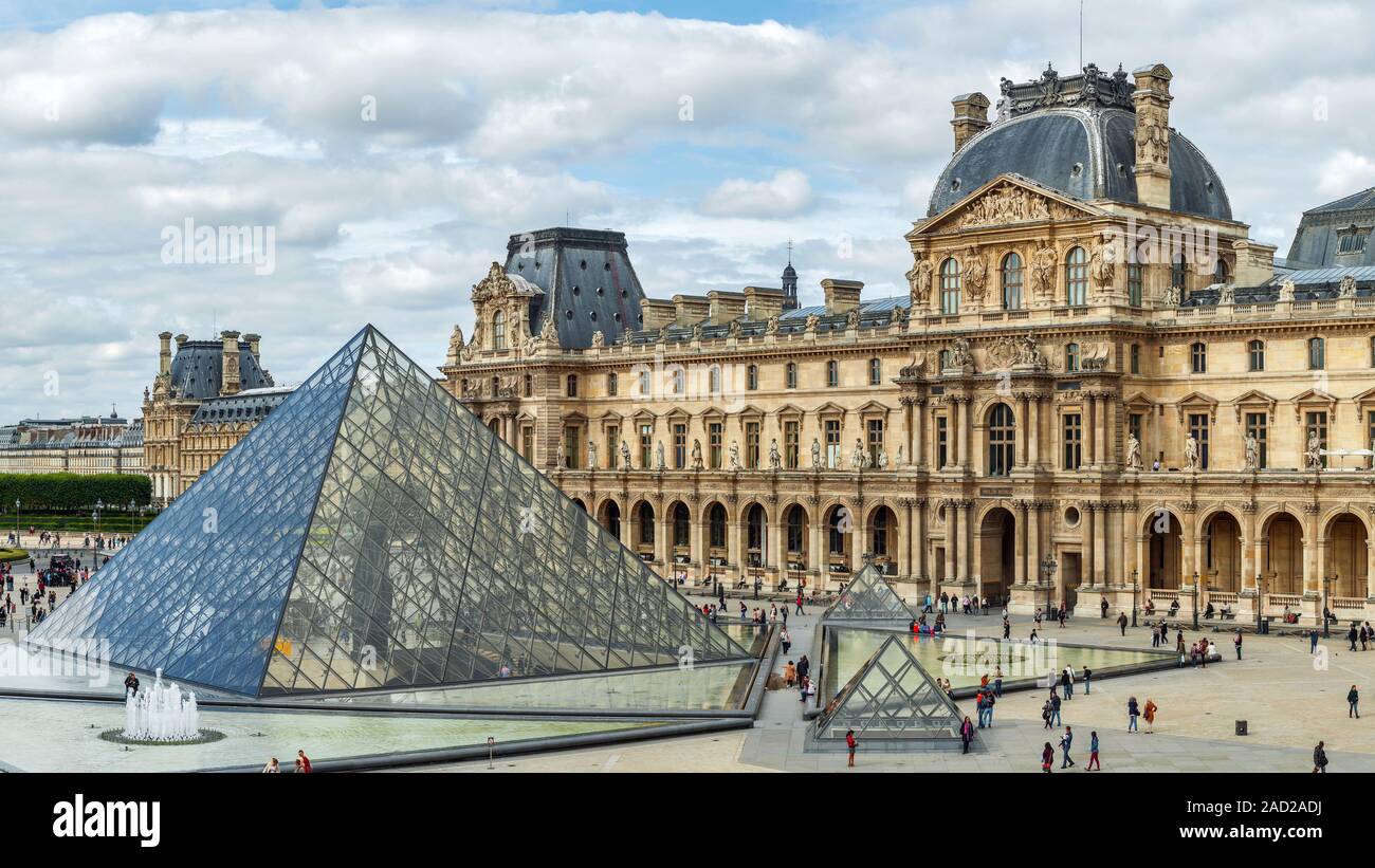 Louvre pyramids and buildings, Paris, France. This structure of glass ...