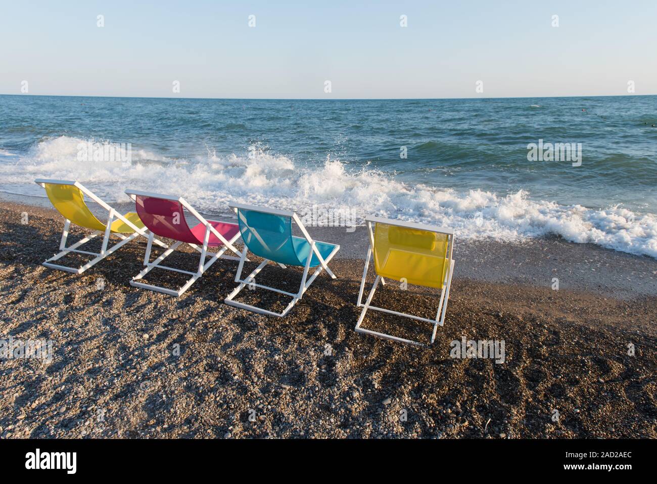 colorful beach chairs Stock Photo - Alamy