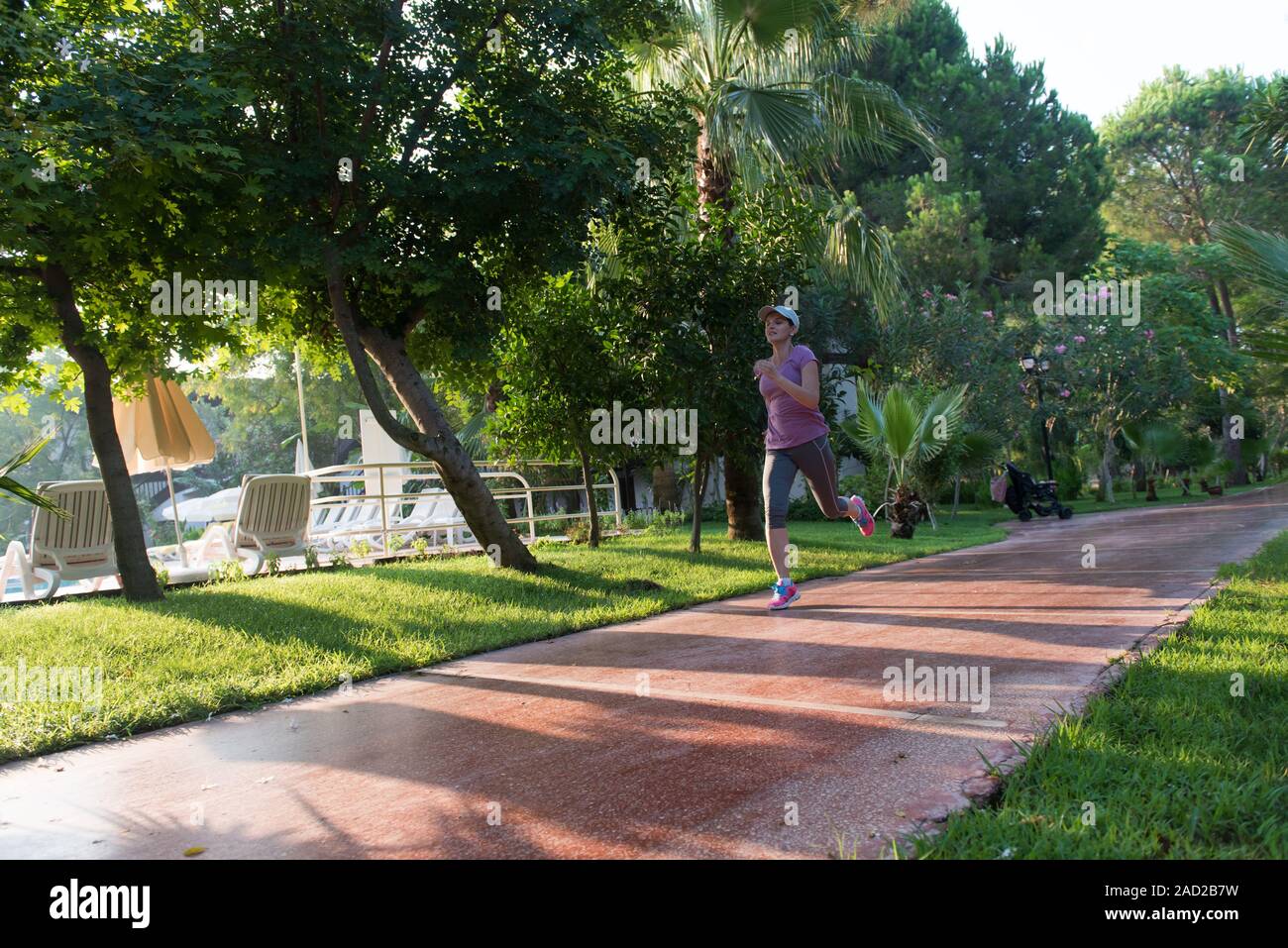 sporty woman jogging Stock Photo - Alamy