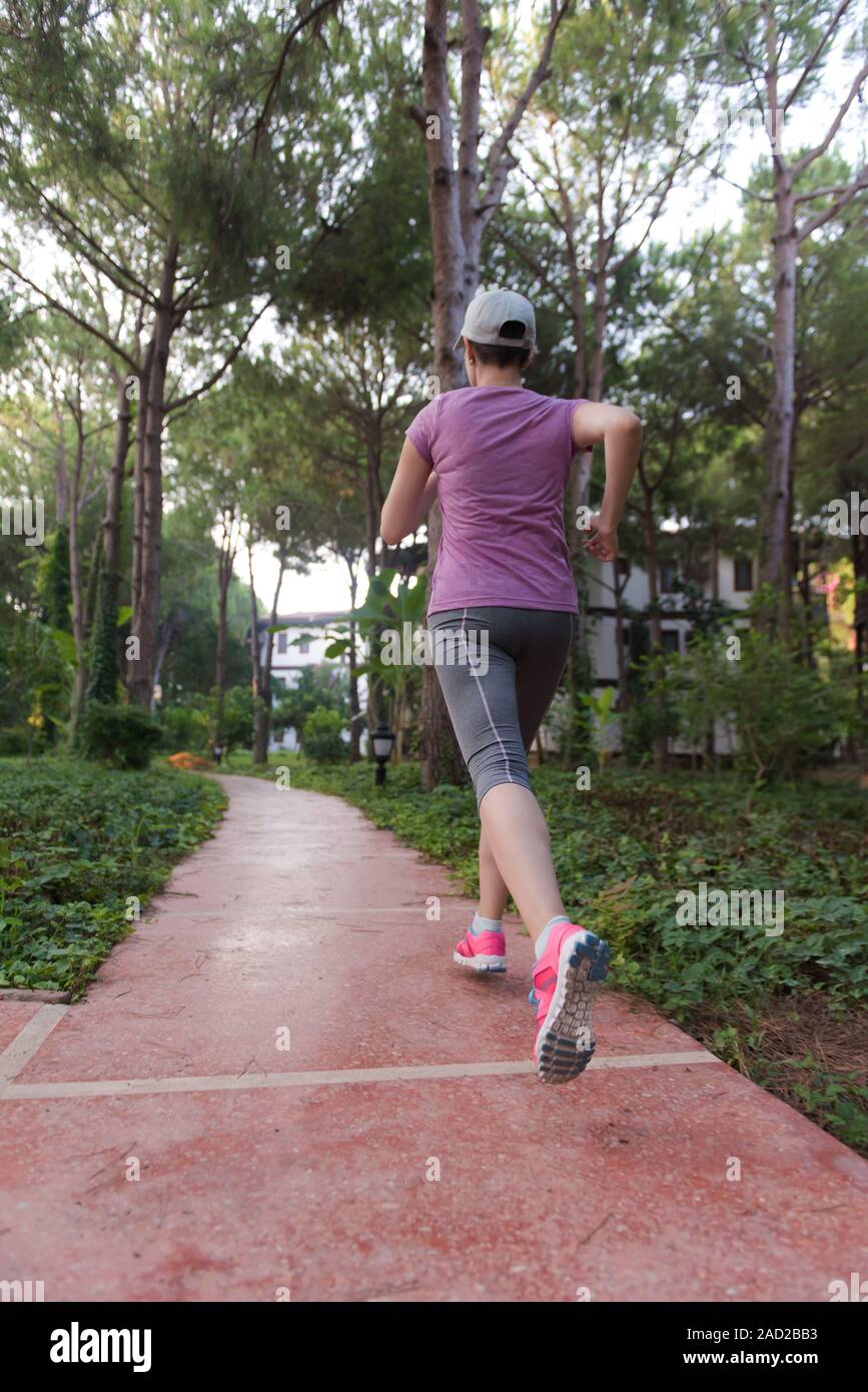 sporty woman jogging Stock Photo - Alamy