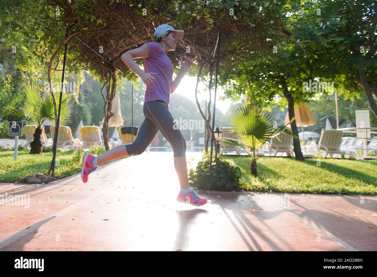 sporty woman jogging Stock Photo - Alamy