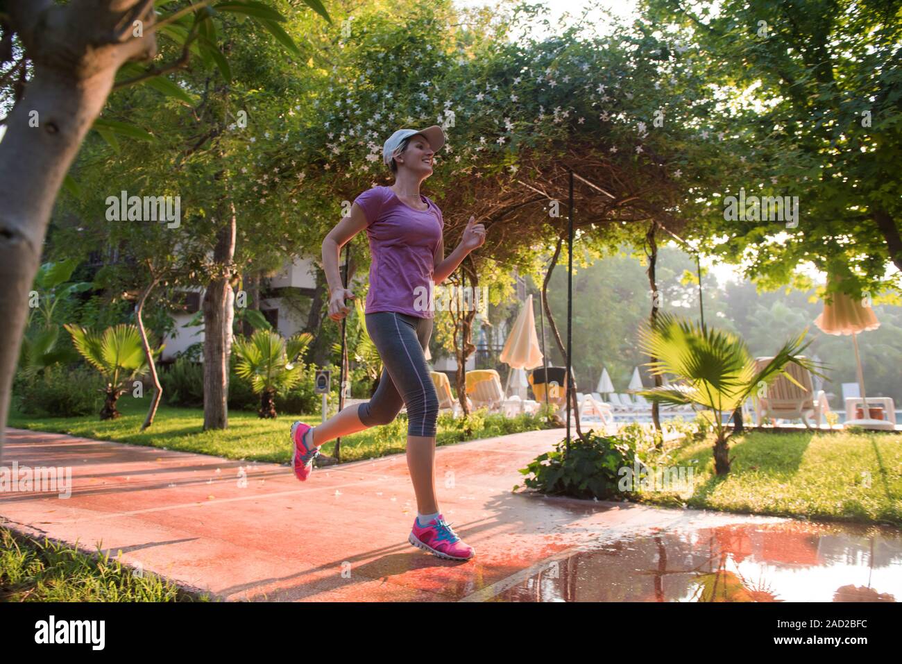 sporty woman jogging Stock Photo - Alamy