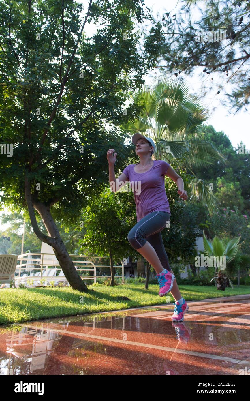 sporty woman jogging Stock Photo - Alamy