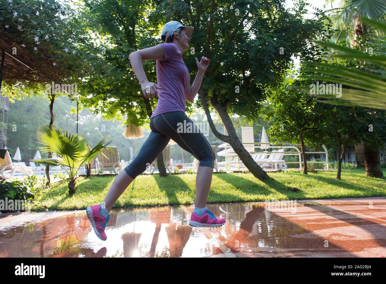 sporty woman jogging Stock Photo - Alamy