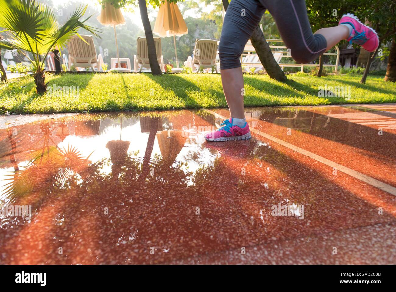 sporty woman jogging Stock Photo - Alamy