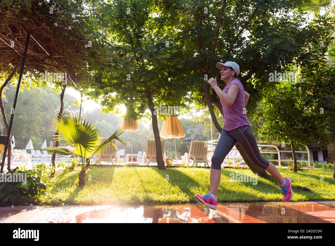 sporty woman jogging Stock Photo - Alamy