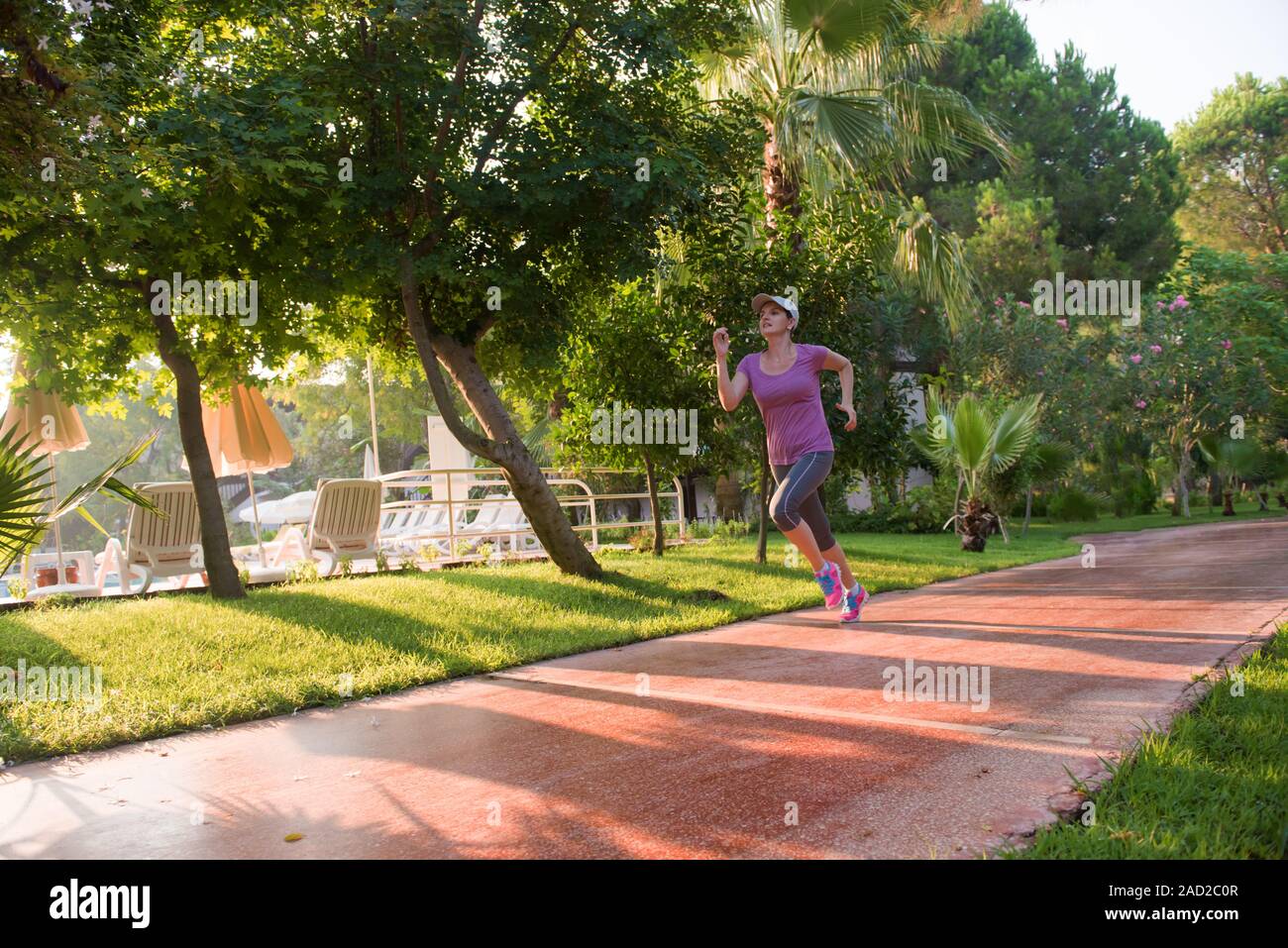 sporty woman jogging Stock Photo - Alamy