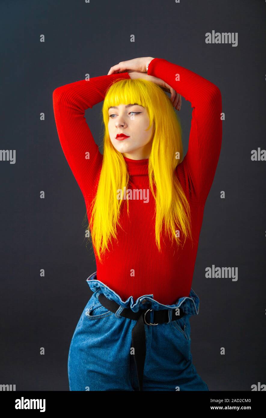 Woman with yellow hair colour hi-res stock photography and images - Alamy