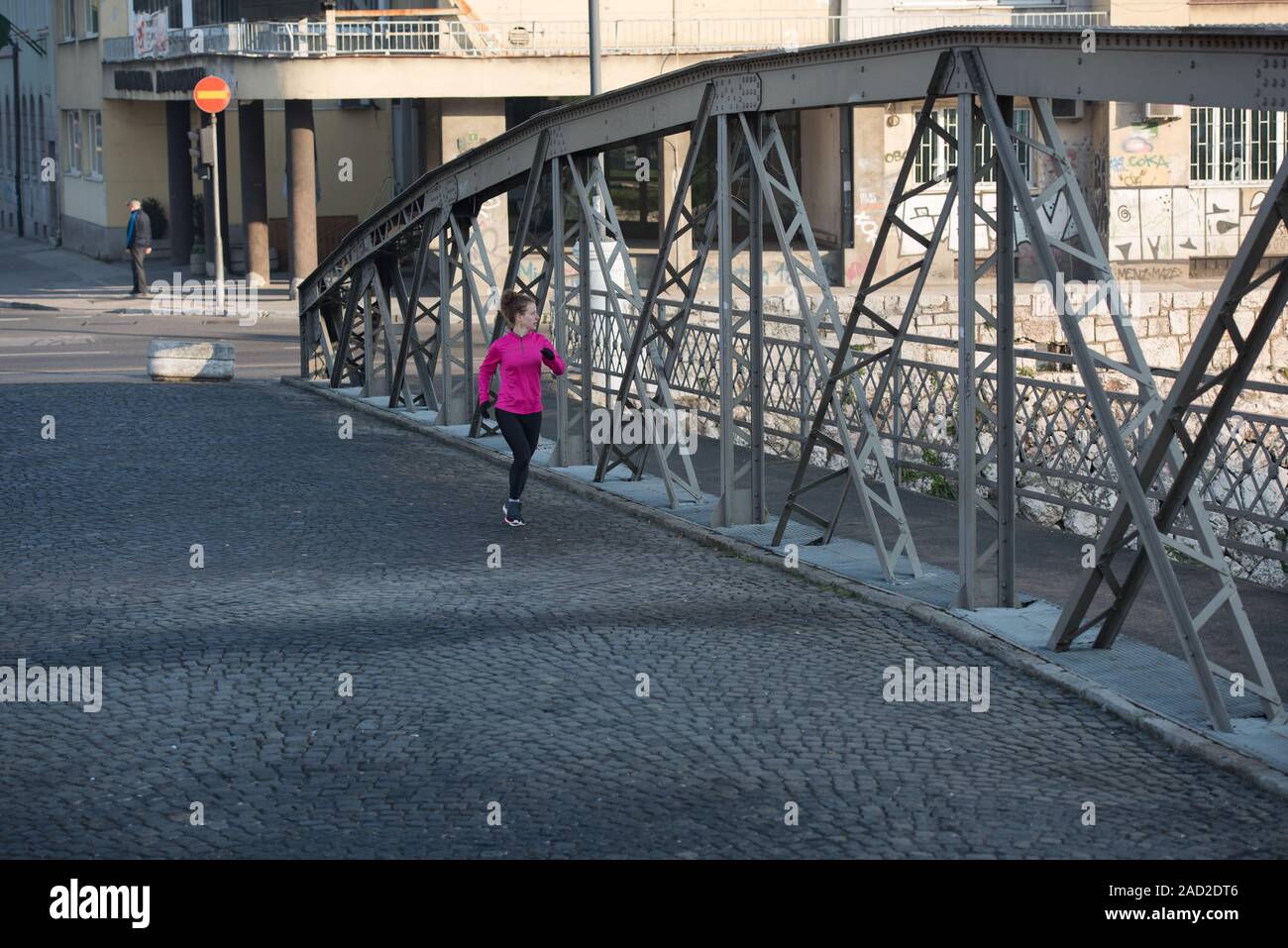 sporty woman jogging on morning Stock Photo - Alamy