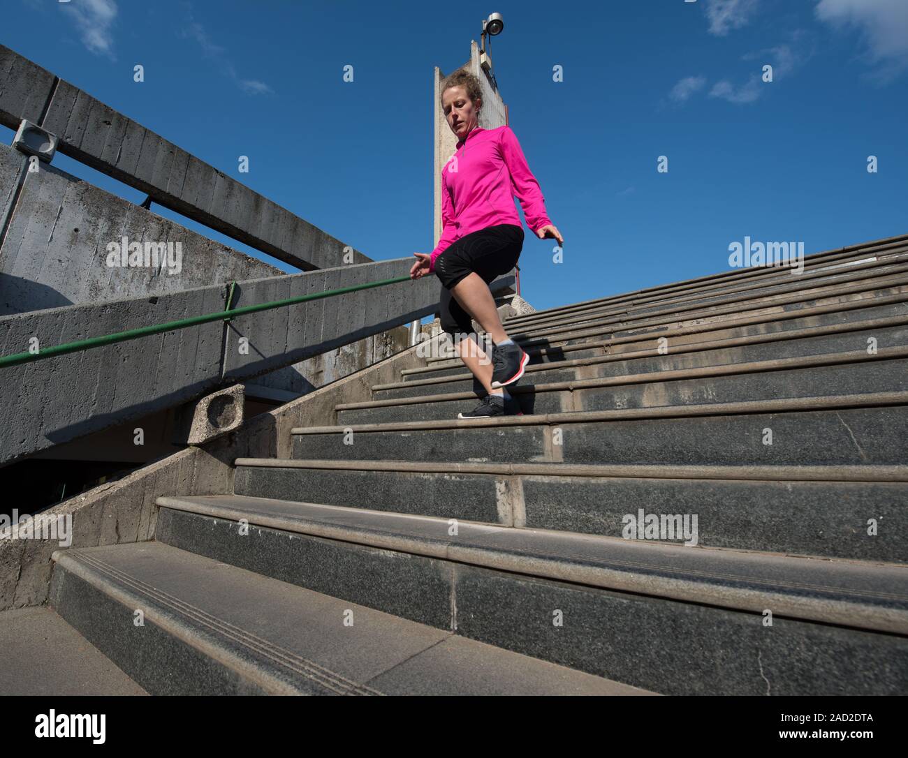 woman jogging on steps Stock Photo - Alamy