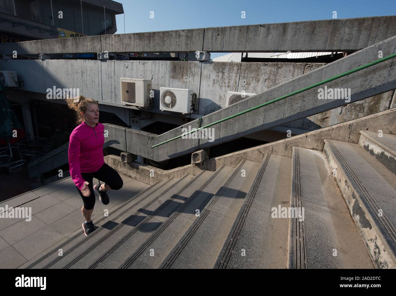 woman jogging on steps Stock Photo - Alamy