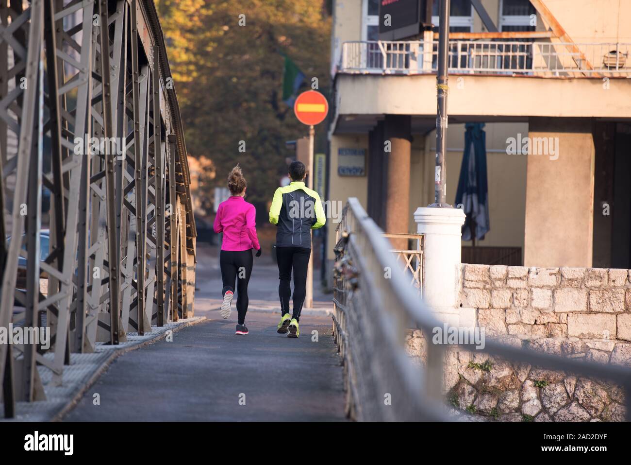 young couple jogging Stock Photo - Alamy
