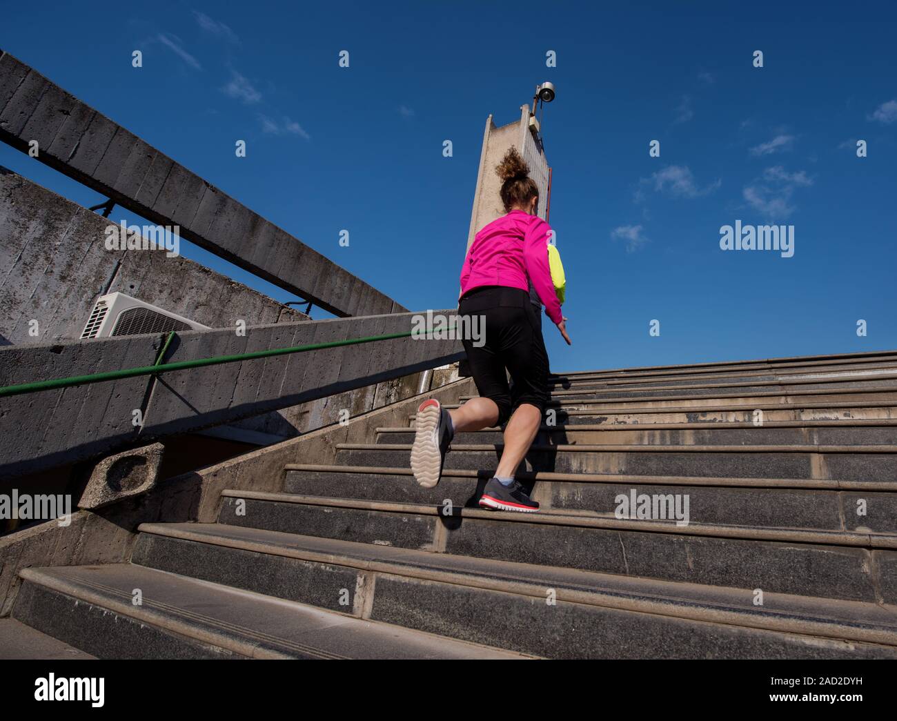 woman jogging on steps Stock Photo - Alamy