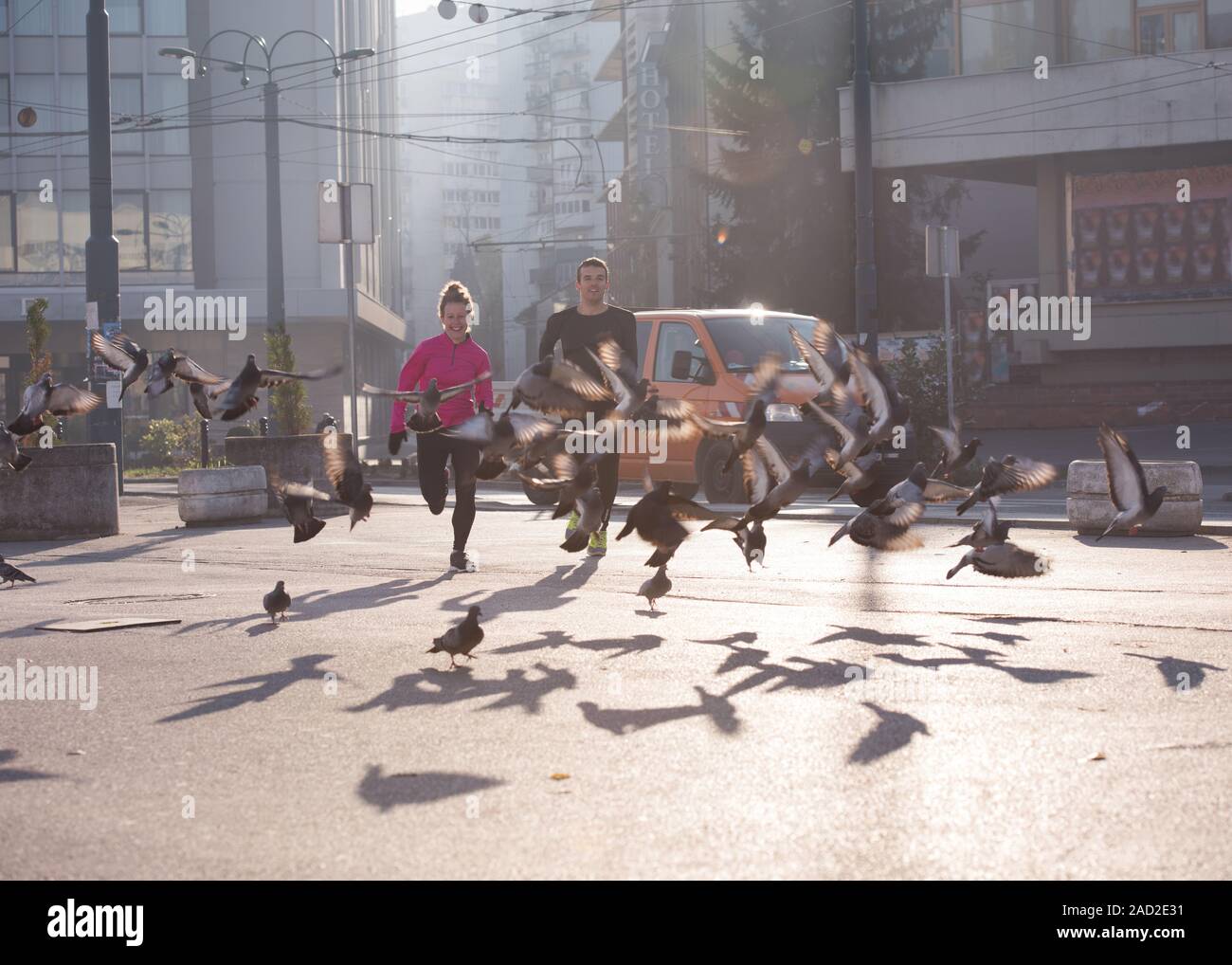 young couple jogging Stock Photo - Alamy